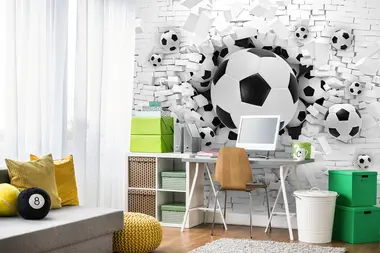 Wall mural Soccer ball breaks through the wall | Uwalls.com
